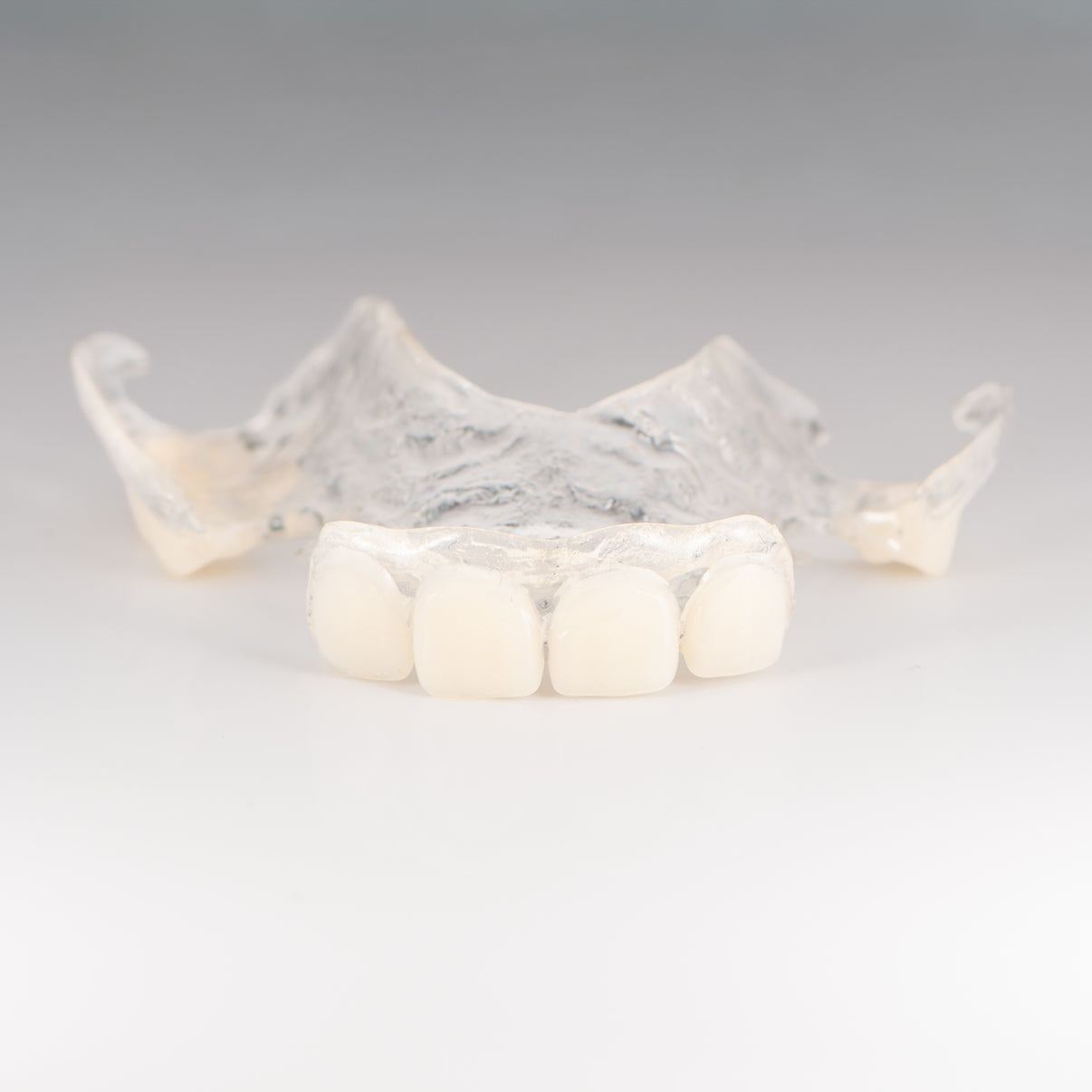 Clear Partial Dentures Online - Flexible Invisible Dentures – Revived ...