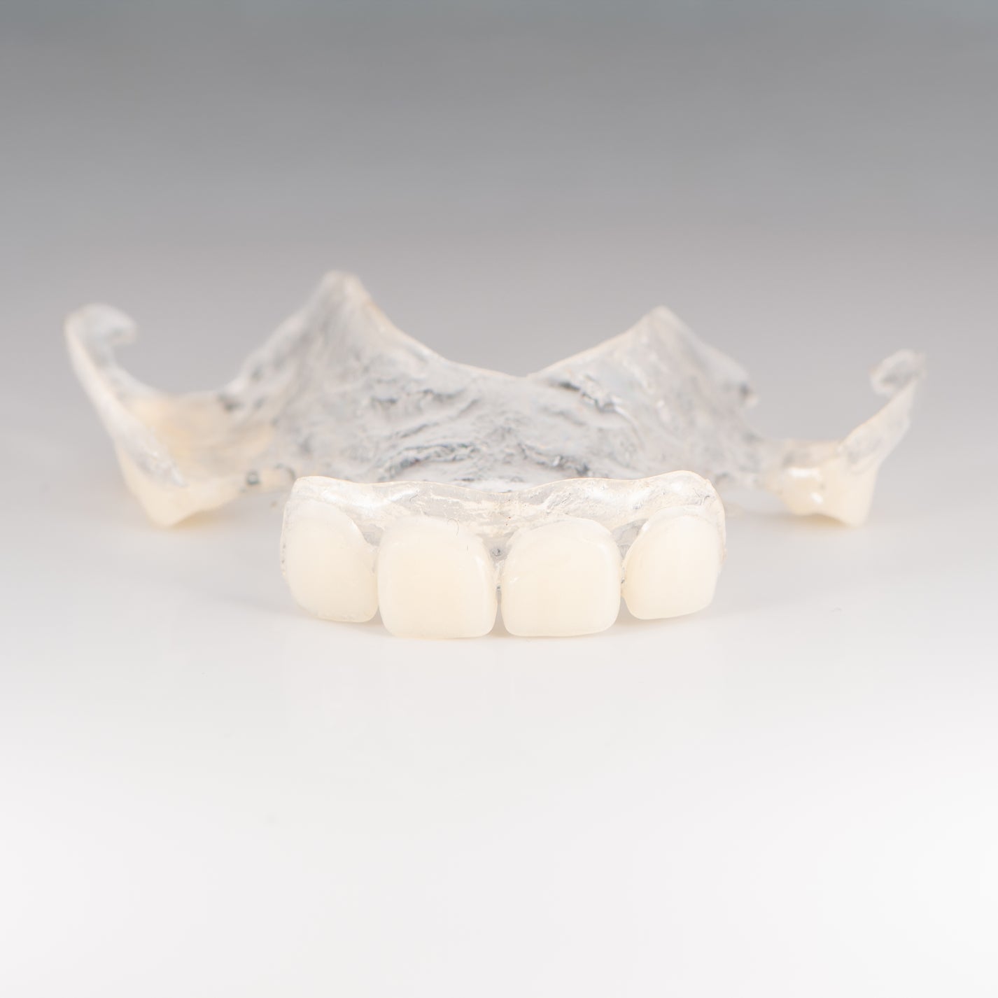Clear Partial Dentures Online - Flexible Invisible Dentures – Revived ...